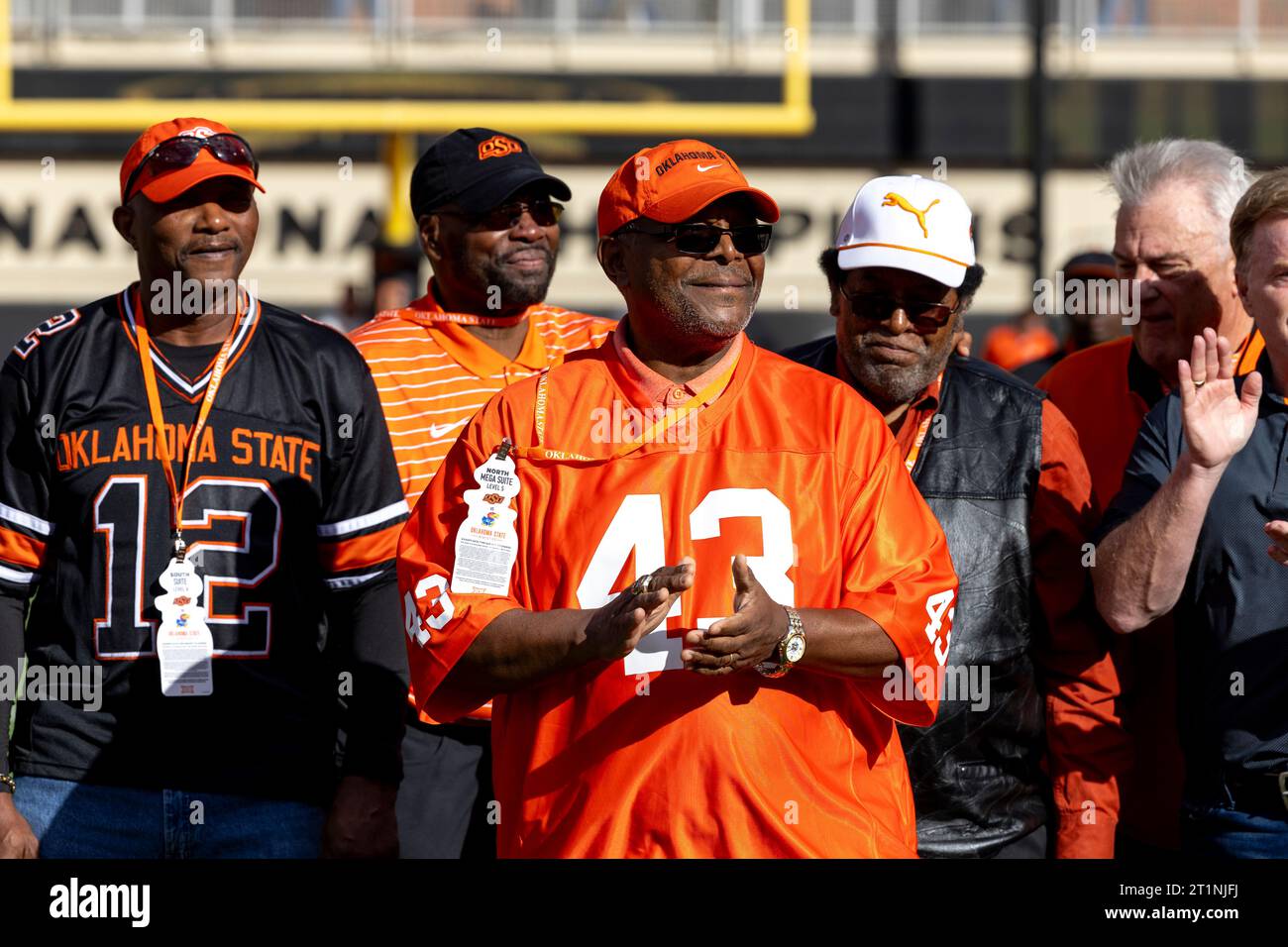 Terry Miller (43) celebrates with friends and family at half time as he ...