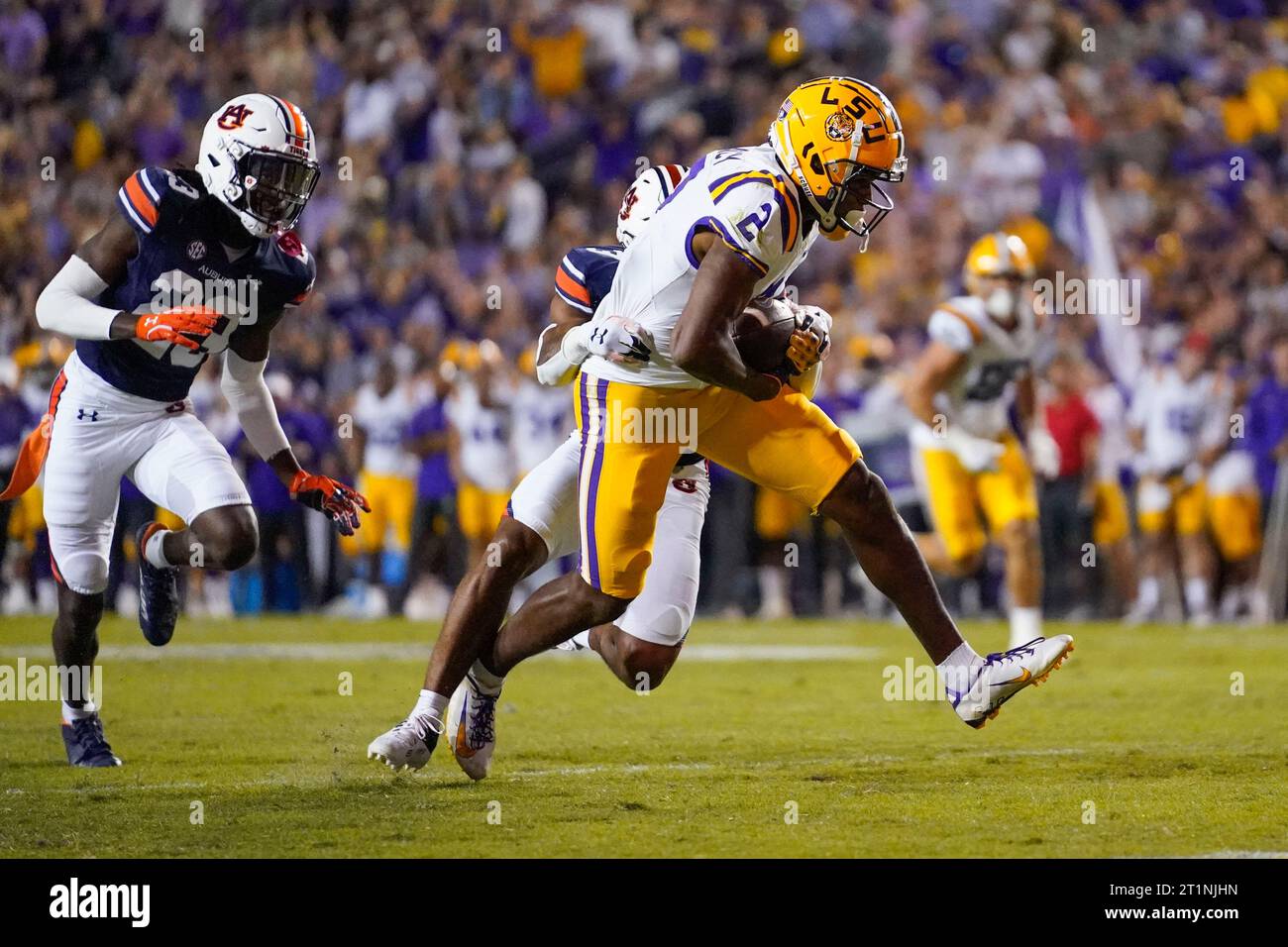 LSU wide receiver Kyren Lacy (2) carries for a touchdown as Auburn ...