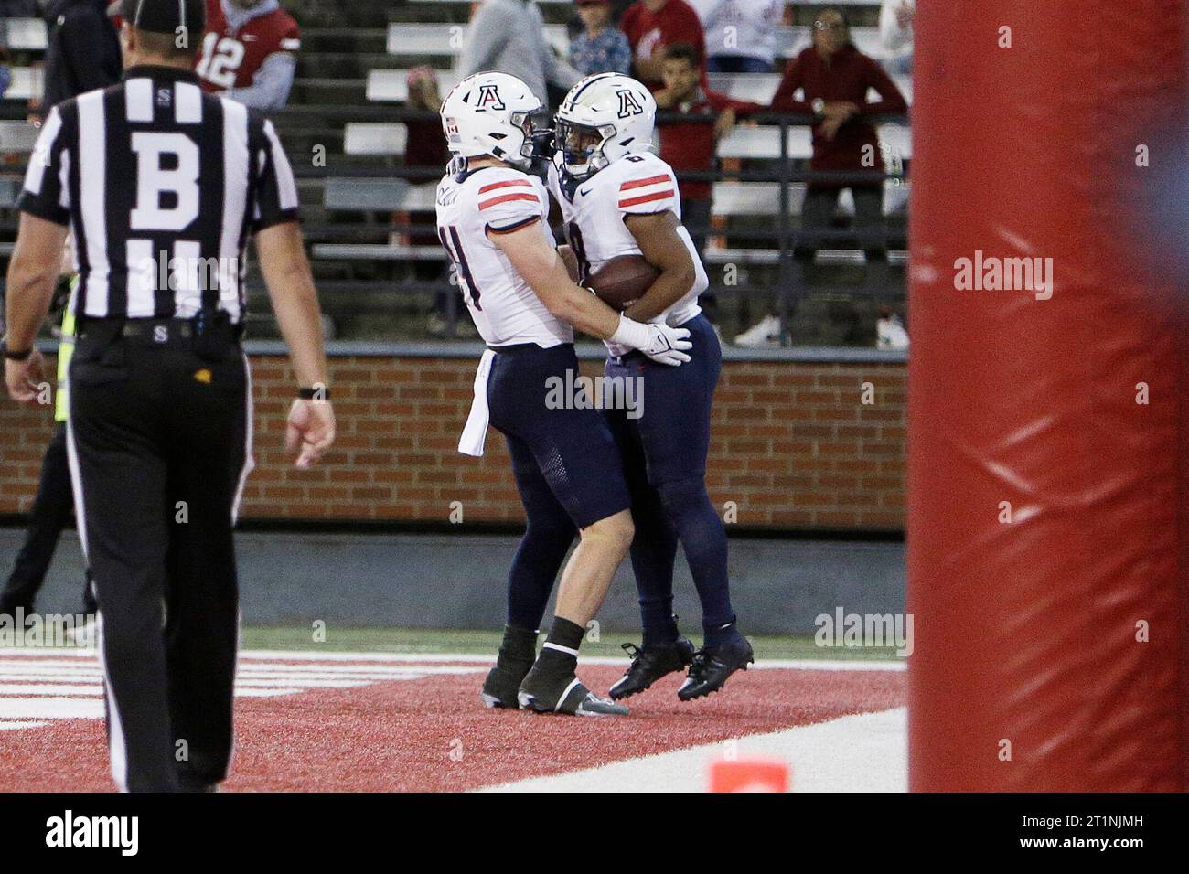 Arizona running back DJ Williams, right, celebrates after his touchdown ...