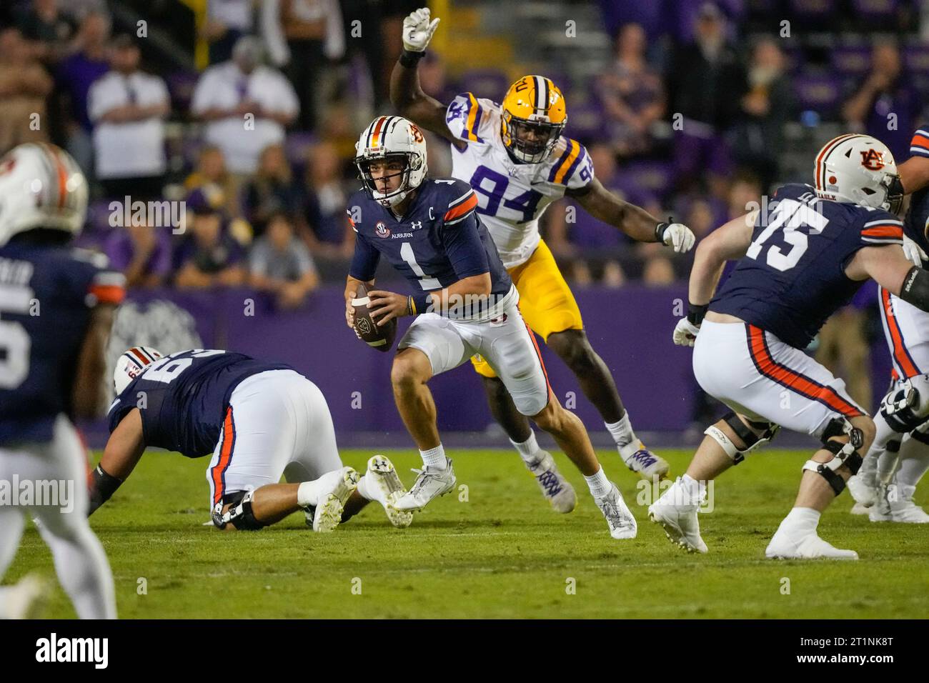 LSU wide receiver Aaron Anderson (1) scrambles under pressure from LSU ...