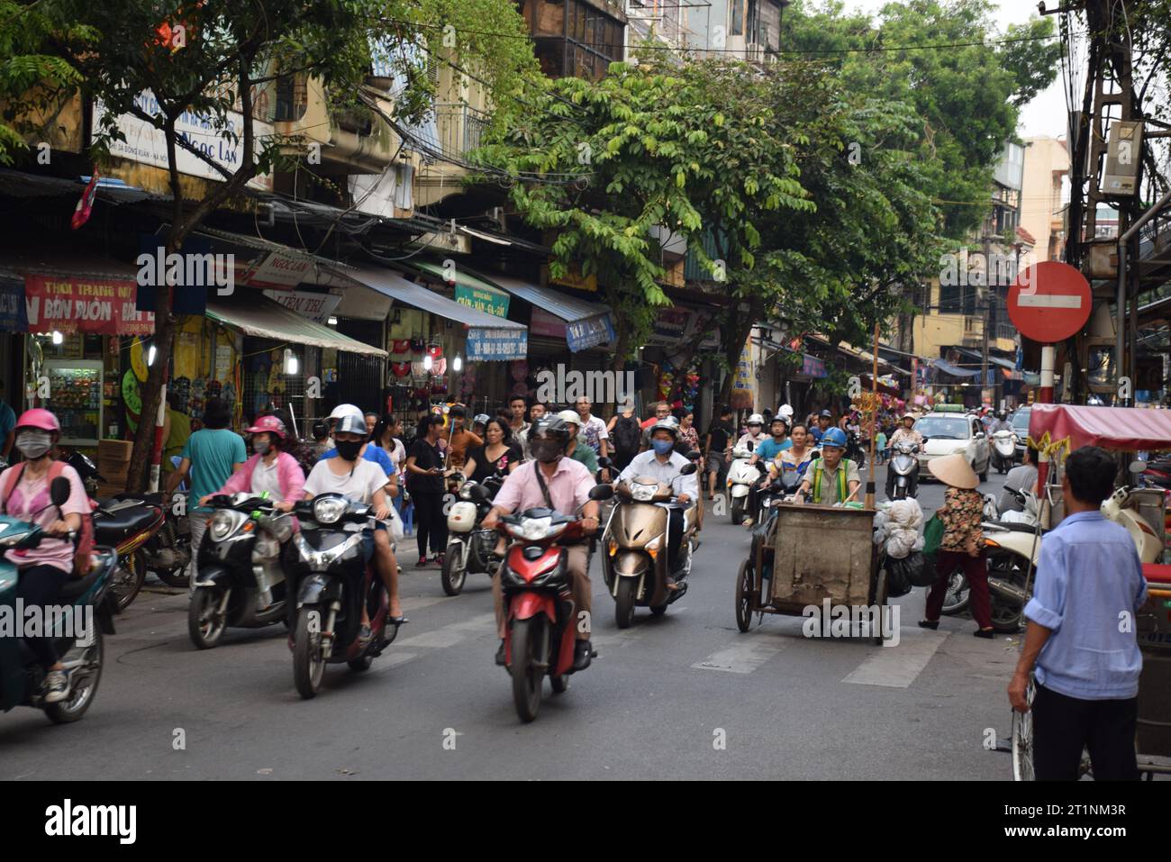 Scooters and motorcycles in the busy streets of the historical center ...
