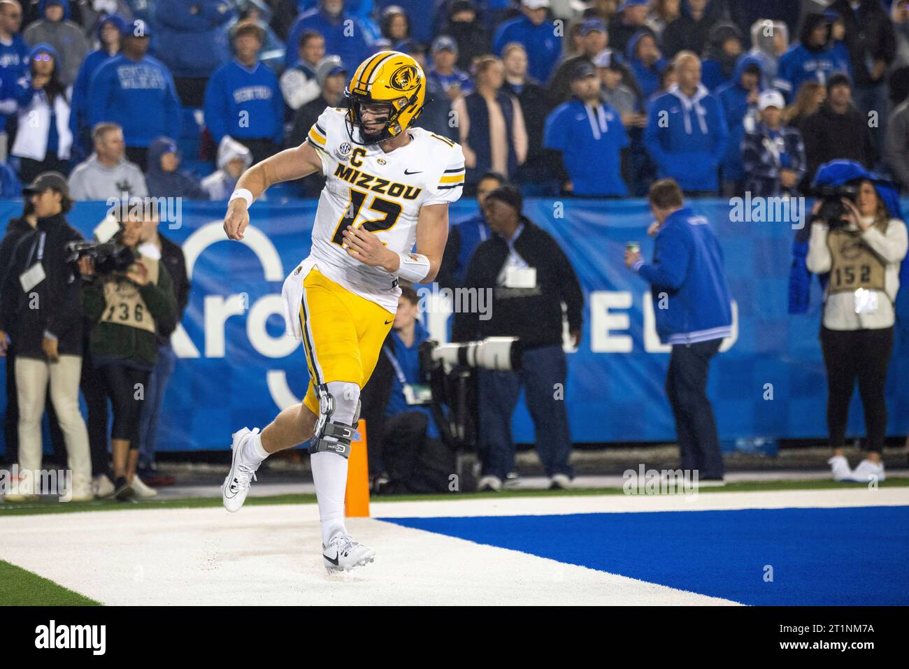 Missouri quarterback Brady Cook (12) celebrates after scoring a ...