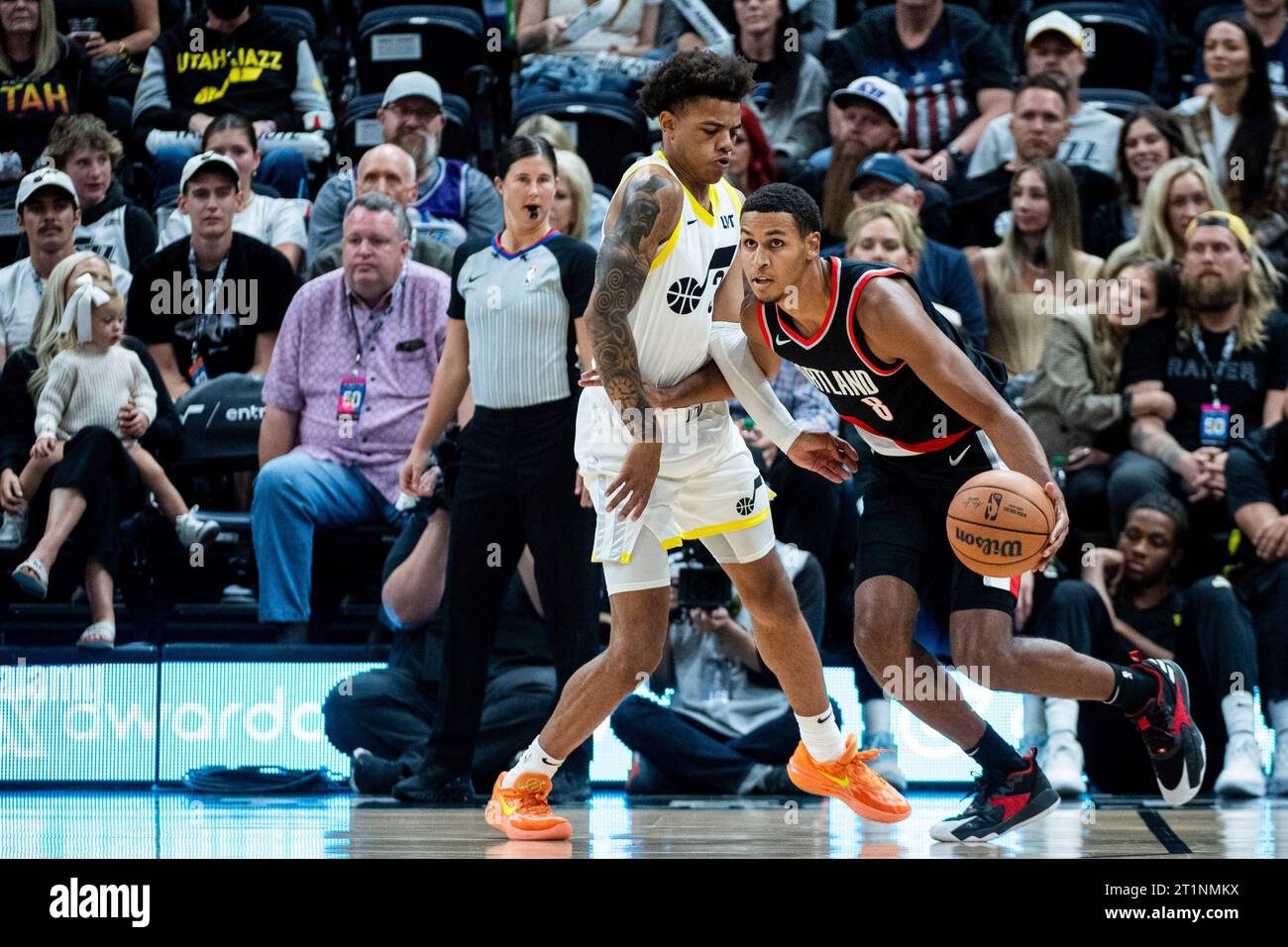 Portland Trail Blazers forward Kris Murray (8) drives the ball around ...