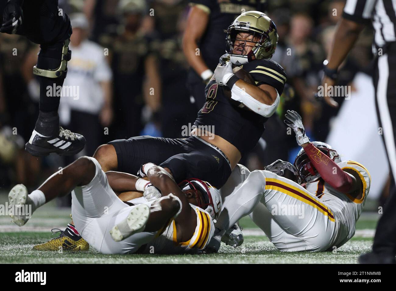 Texas State running back Donerio Davenport (8) is tackled by Louisiana ...