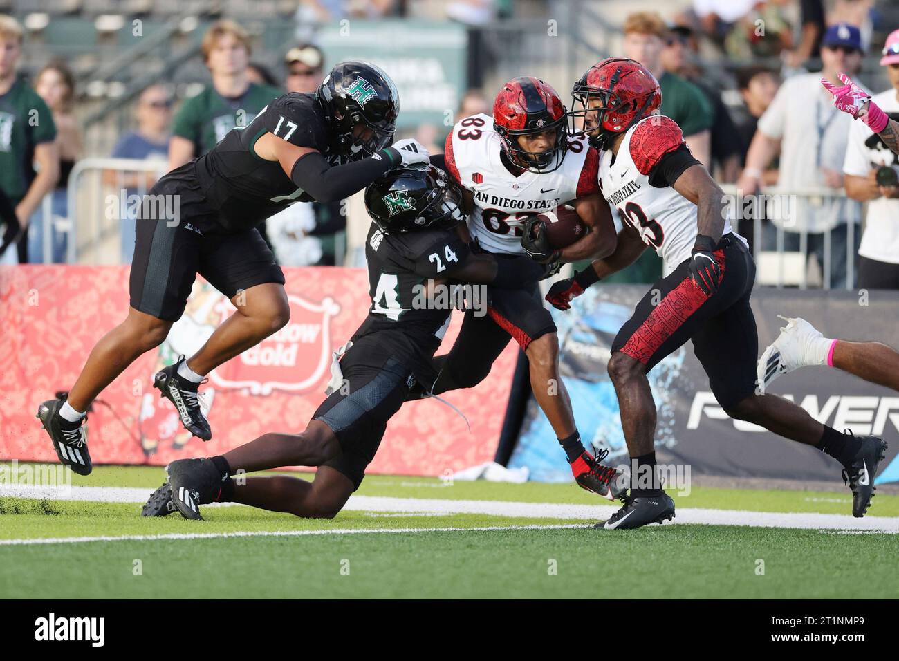 San Diego State wide receiver Mekhi Shaw (83) tries to get away from ...