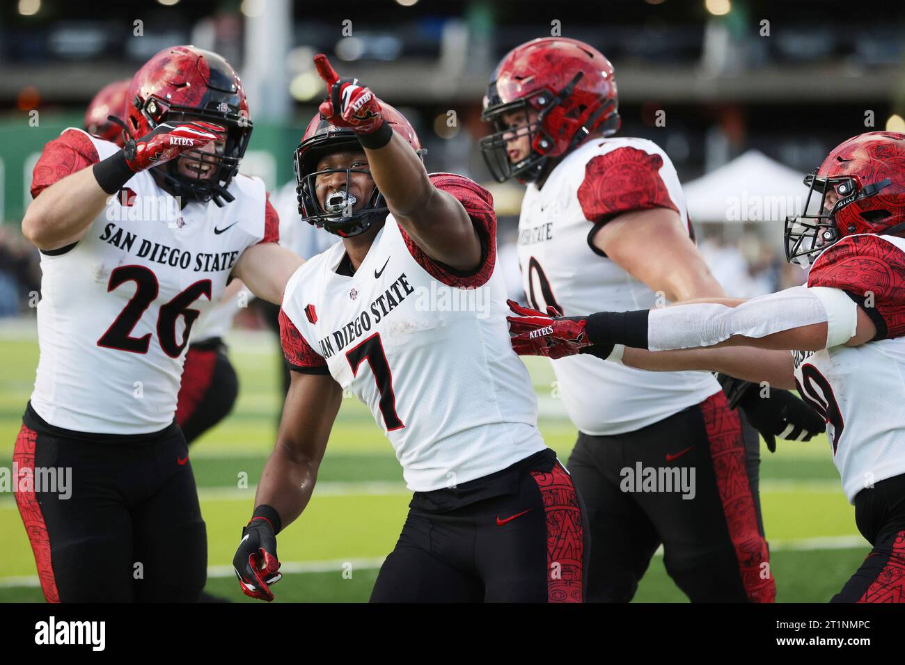 San Diego State running back Lucky Sutton (7) celebrates with teammates ...