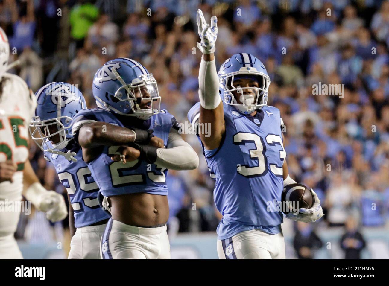 North Carolina linebacker Cedric Gray (33) celebrates his interception ...