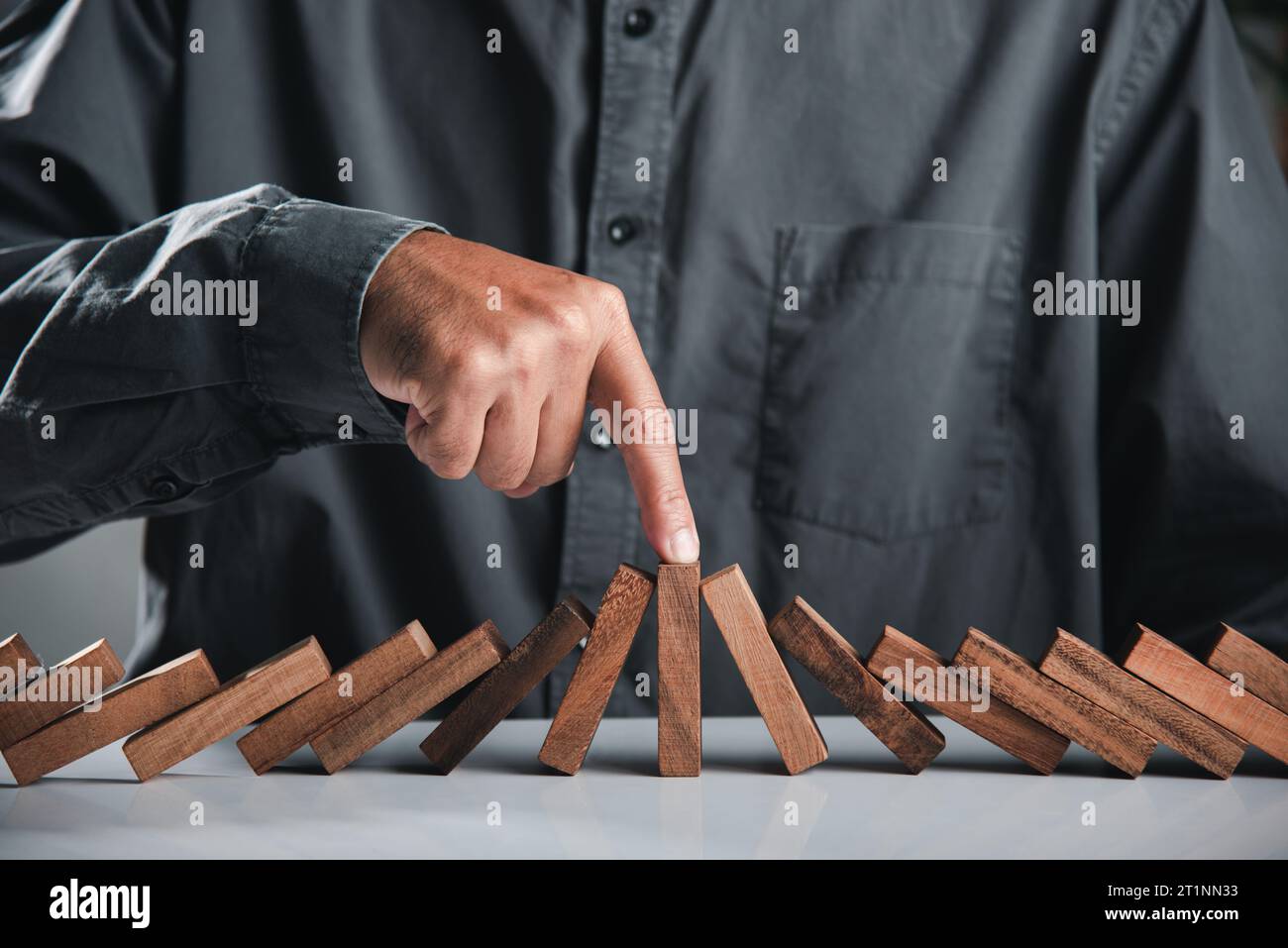 Domino effect stopped one hi-res stock photography and images - Alamy