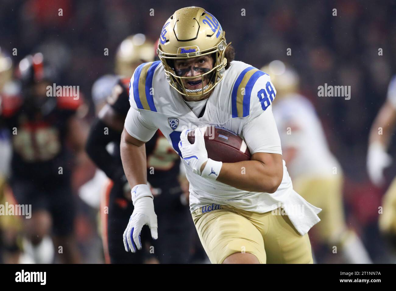 UCLA tight end Moliki Matavao rushes against Oregon State during the ...