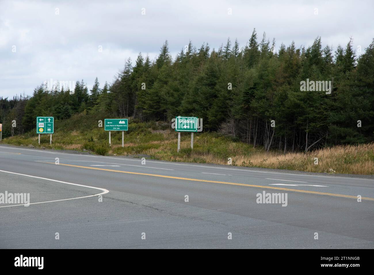 Highway signs at the junction of Trans Canada Highway and highway 210 ...
