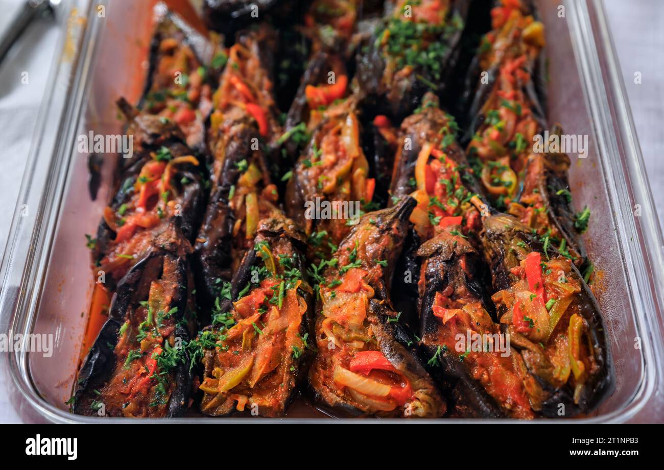 Imam bayildi translated as imam fainted, eggplant suffed with onion ...