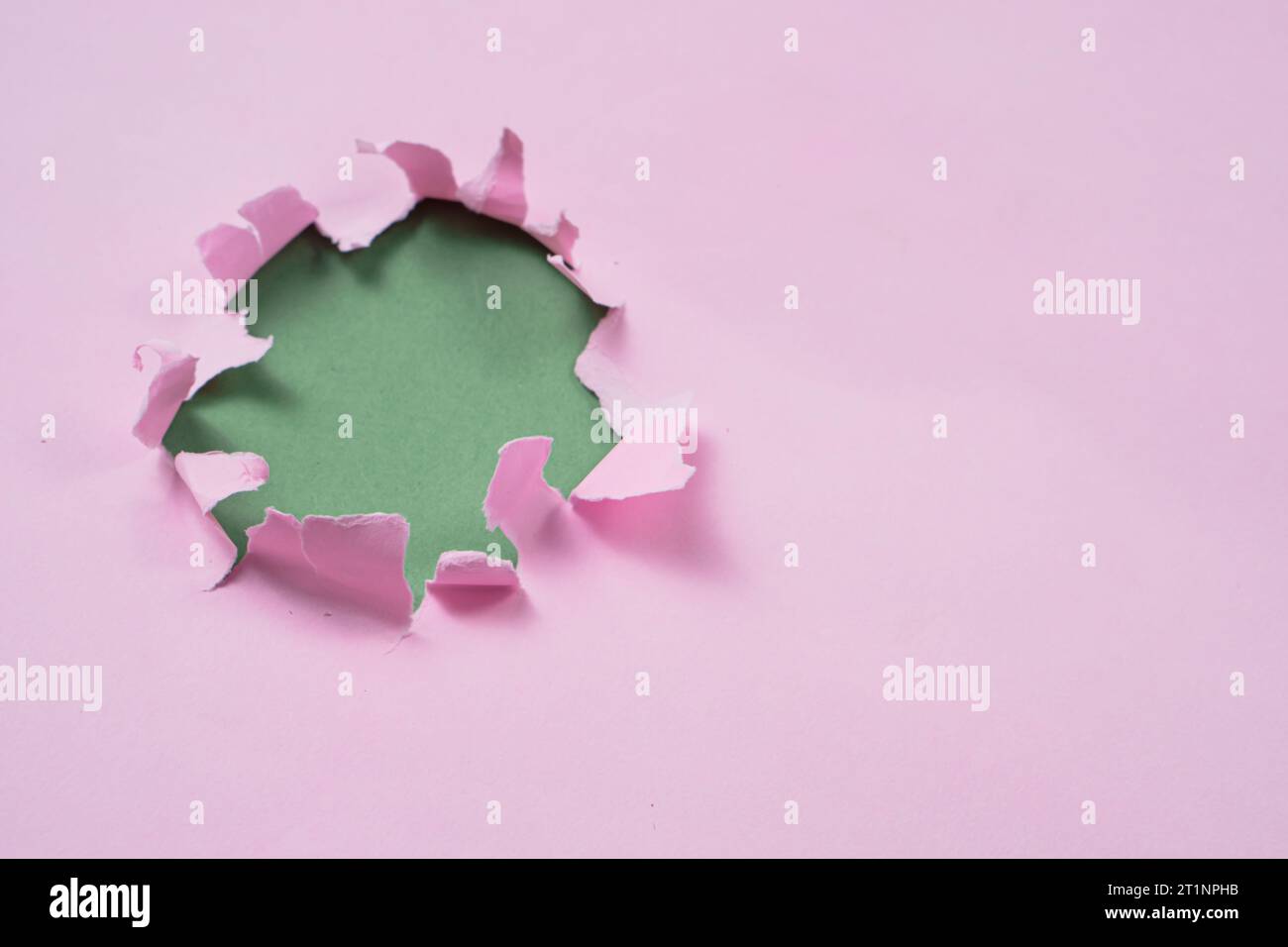 Ripped pink paper hi-res stock photography and images - Alamy