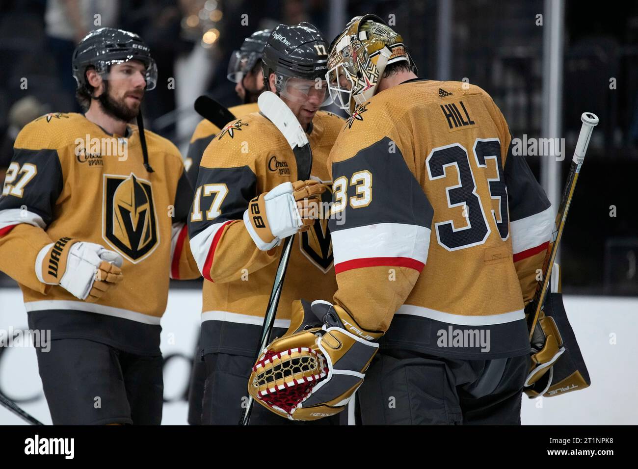Vegas Golden Knights defenseman Ben Hutton (17) and goaltender Adin ...