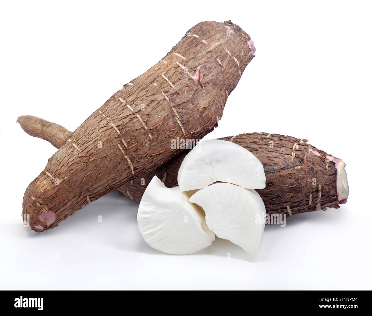 Cassava root isolated on white background Stock Photo - Alamy
