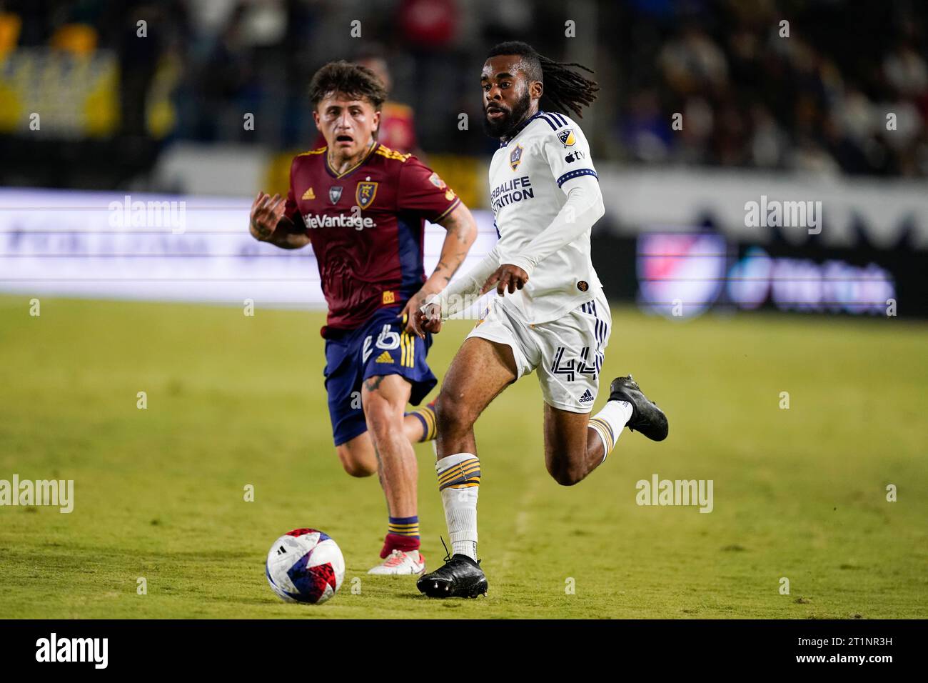 LA Galaxy forward Raheem Edwards, right, dribbles the ball as Real Salt ...