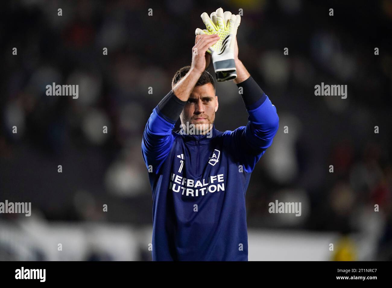 LA Galaxy goalkeeper Jonathan Bond waves to the crowd after the team's ...