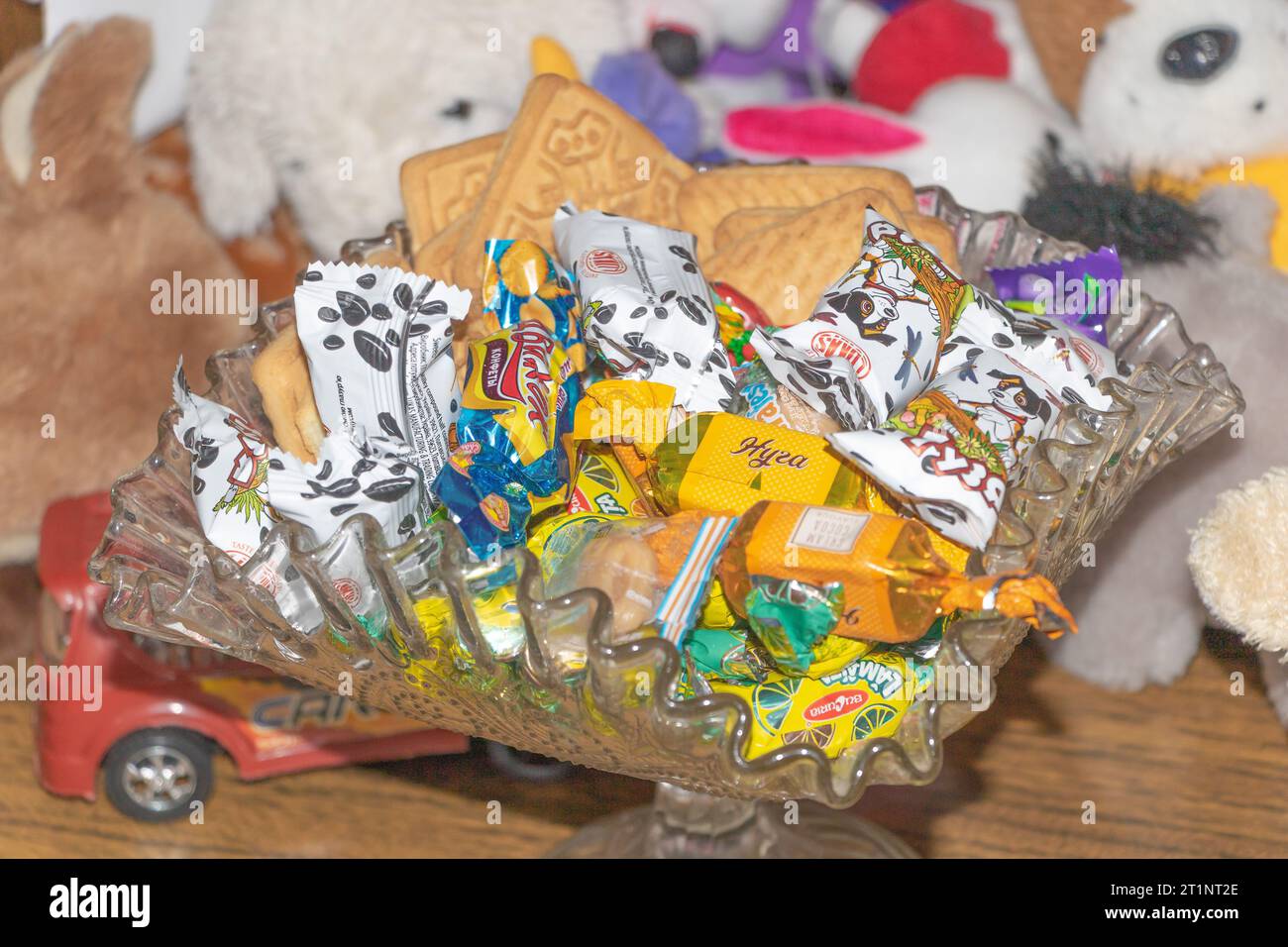 Chisinau, Moldova - October 10, 2021 A glass bowl filled with candy and ...