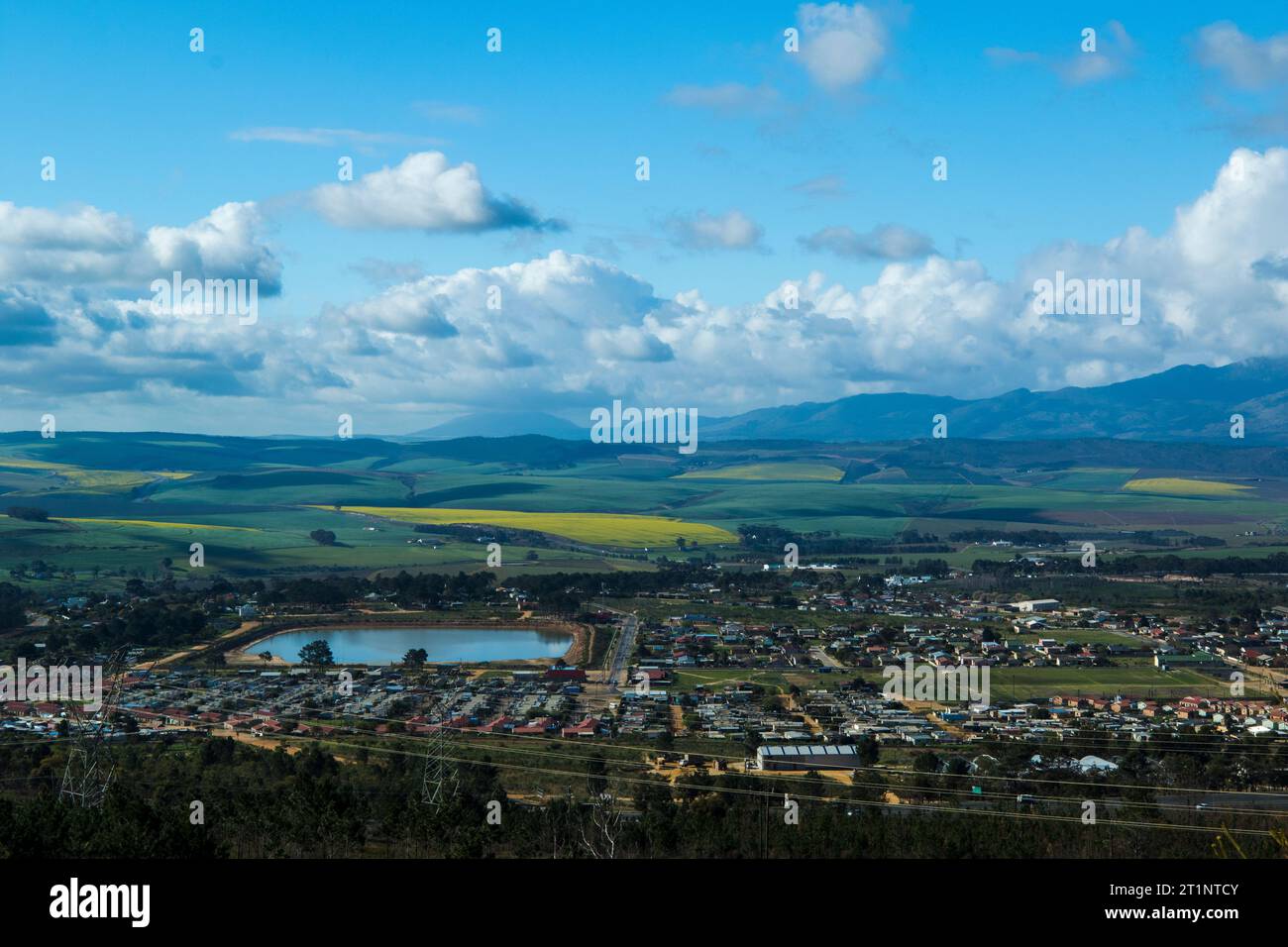 Top view on the agricultural town located in the middle of valley and ...