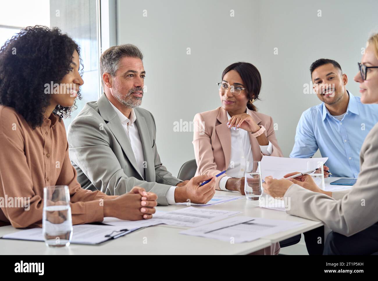 Diverse business team people having discussion at office meeting Stock ...