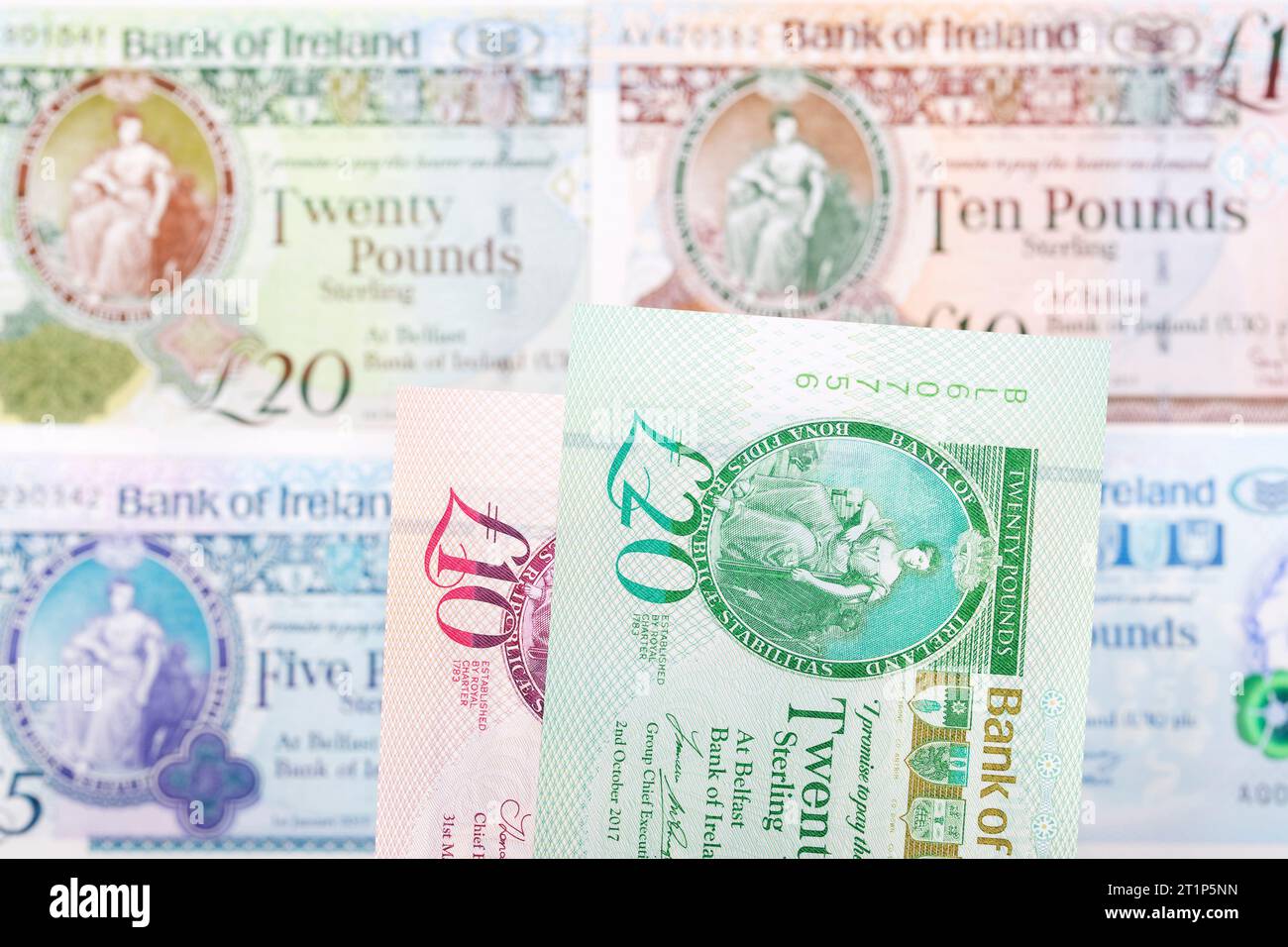Irish money - pound a business background Stock Photo - Alamy