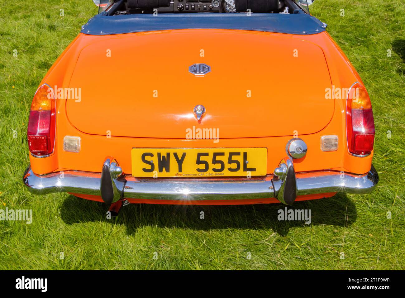 rear of Orange MG spMidget orts car SWY555L 1973 Stock Photo - Alamy