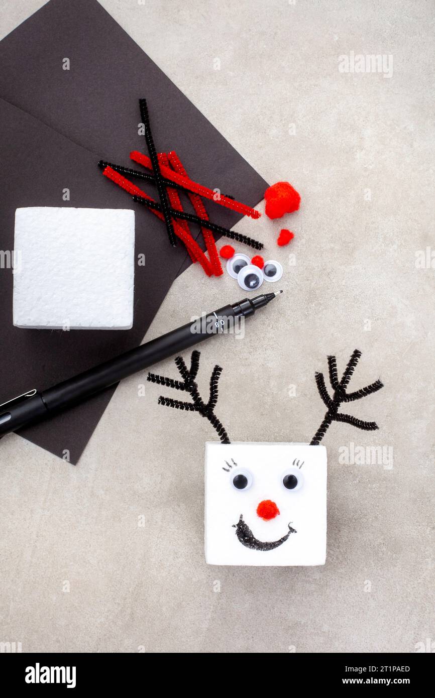 Santa reindeer making snowman hi-res stock photography and images - Alamy