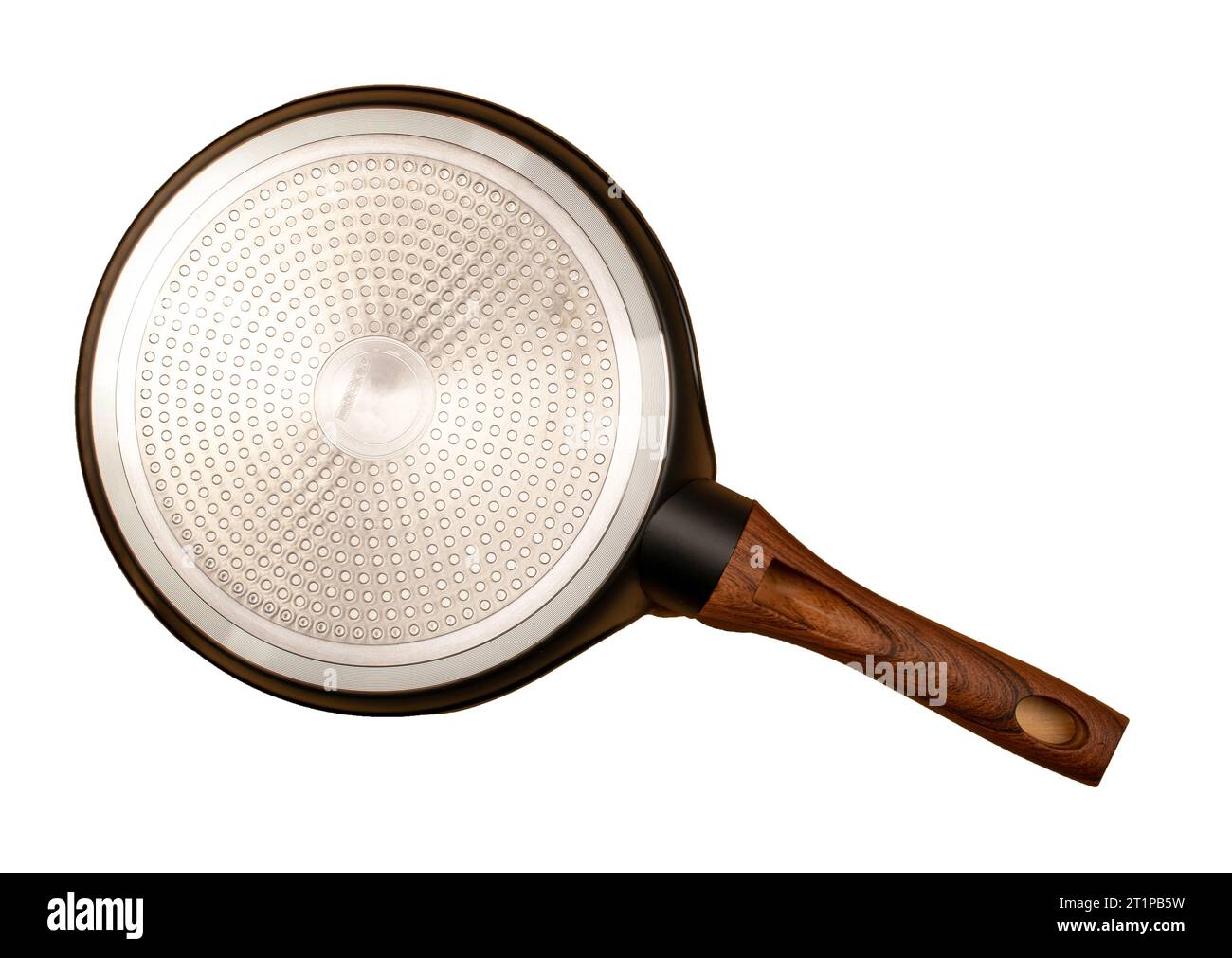 One metal pancake pan, macro, isolated on white background, top view ...