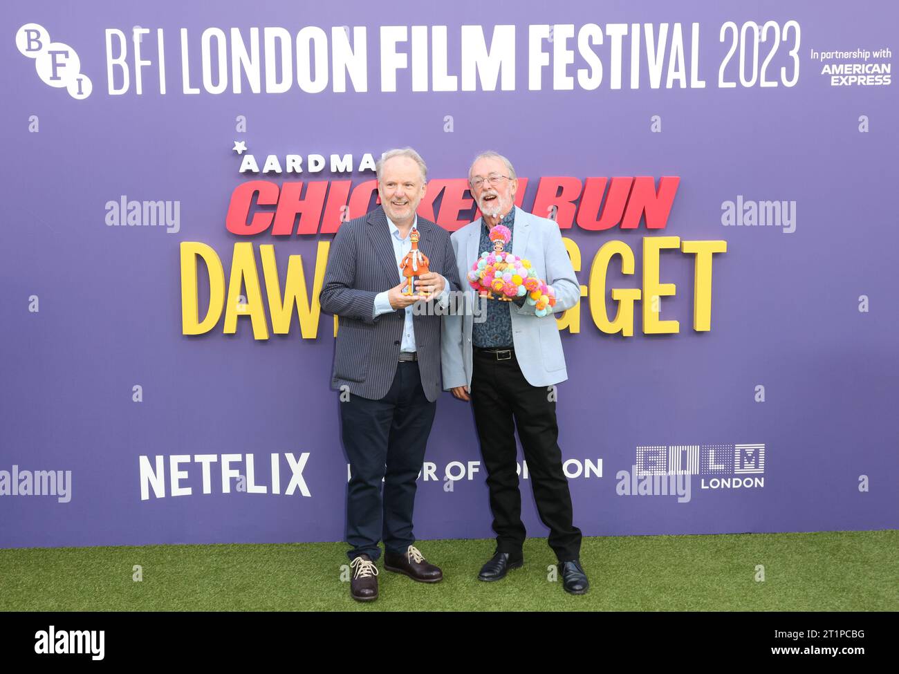 Nick Park with Chicken character Ginger and Peter Lord with Chicken ...