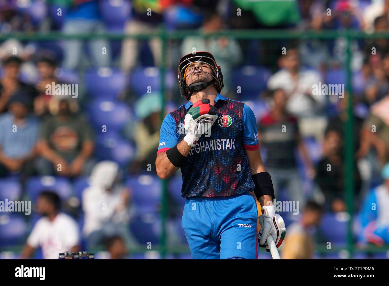 Afghanistan's Rahmanullah Gurbaz looks skywards as he celebrates his ...