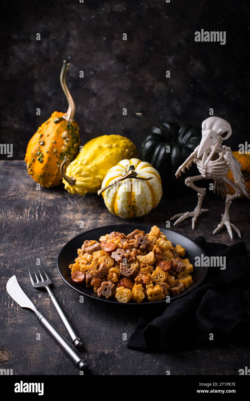 Halloween pasta in shape of spider, bat and pumpkin Stock Photo - Alamy