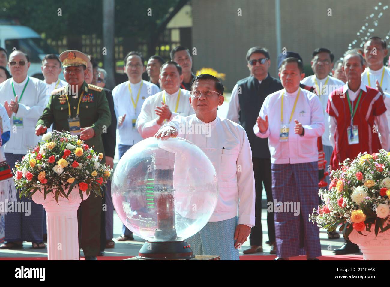 Senior Gen. Min Aung Hlaing, head of the military council, center ...