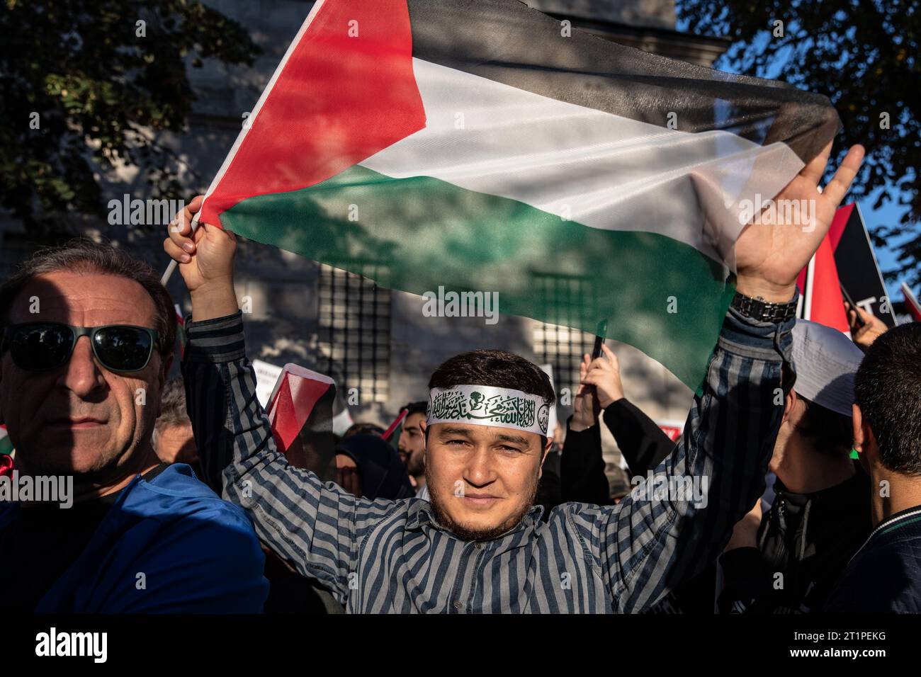 Istanbul, Turkey. 14th Oct, 2023. A man holds a Palestinian flag during ...