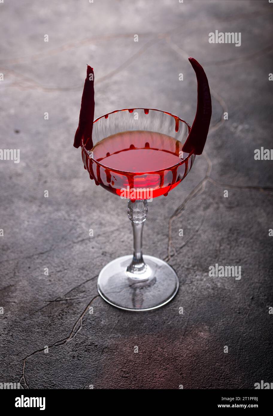 Halloween cocktail Red Devil martini Stock Photo - Alamy