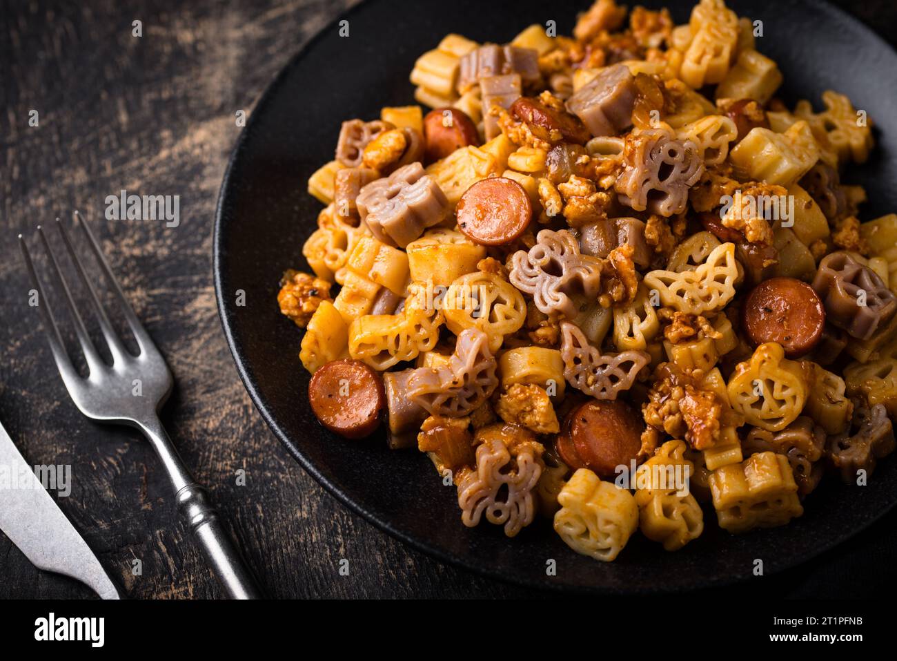 Halloween pasta in shape of spider, bat and pumpkin Stock Photo - Alamy