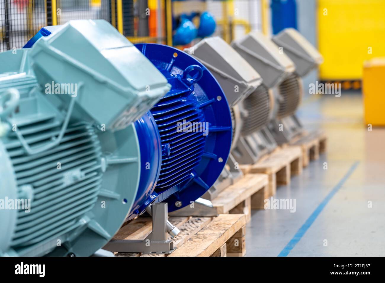 new electric motors different colors and sizes on pallets in the ...