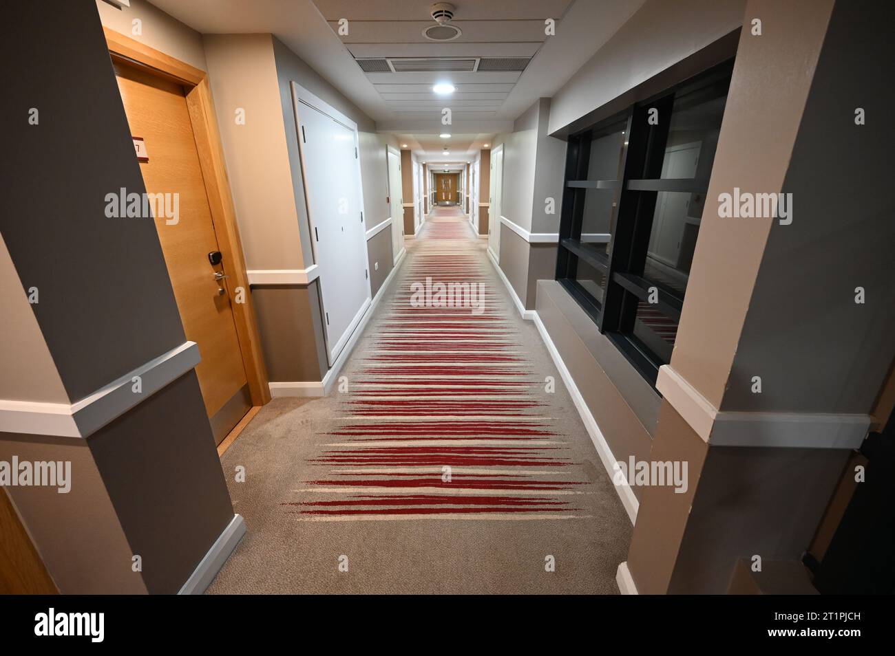 Stacked chairs in a function room in the UK Stock Photo - Alamy