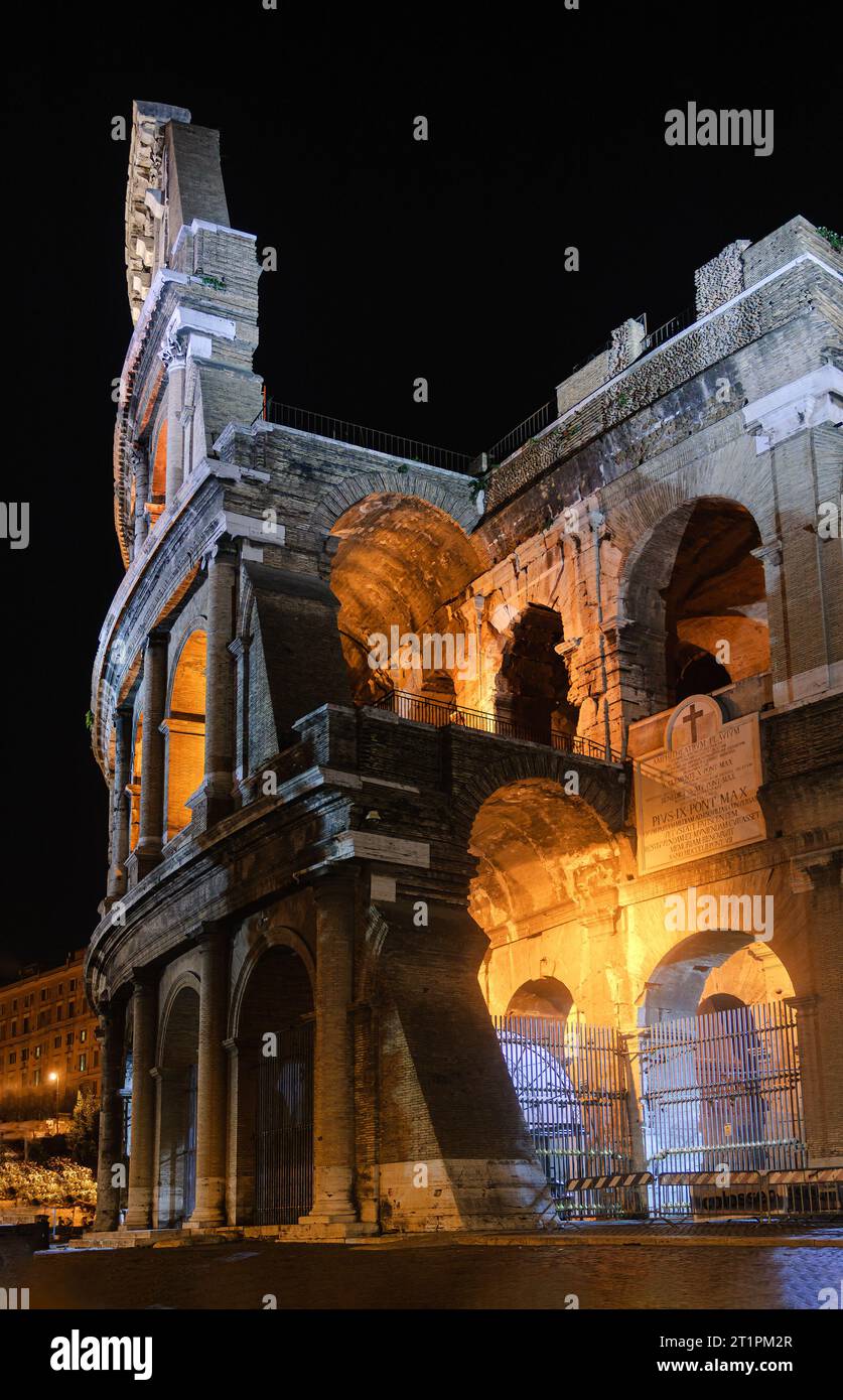 Vertical view of Colosseum in Rome illuminated at night Stock Photo - Alamy