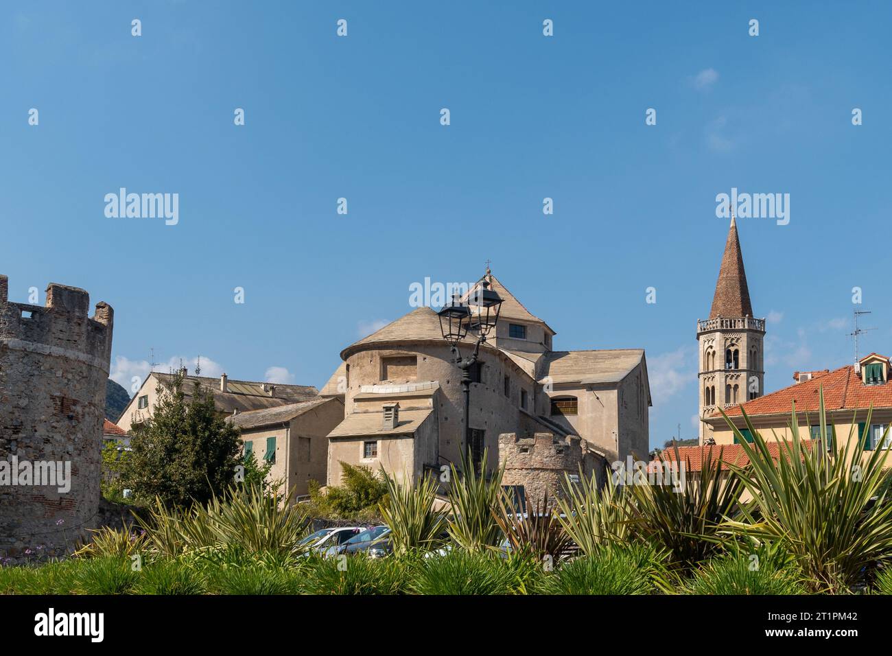 The medieval village of Finalborgo with the city walls and the Church ...