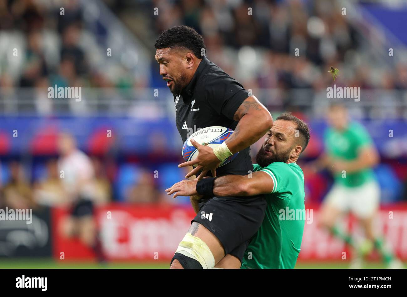 Paris, France. 14th Oct, 2023. Ardie Savea of New Zealand is tackled by ...
