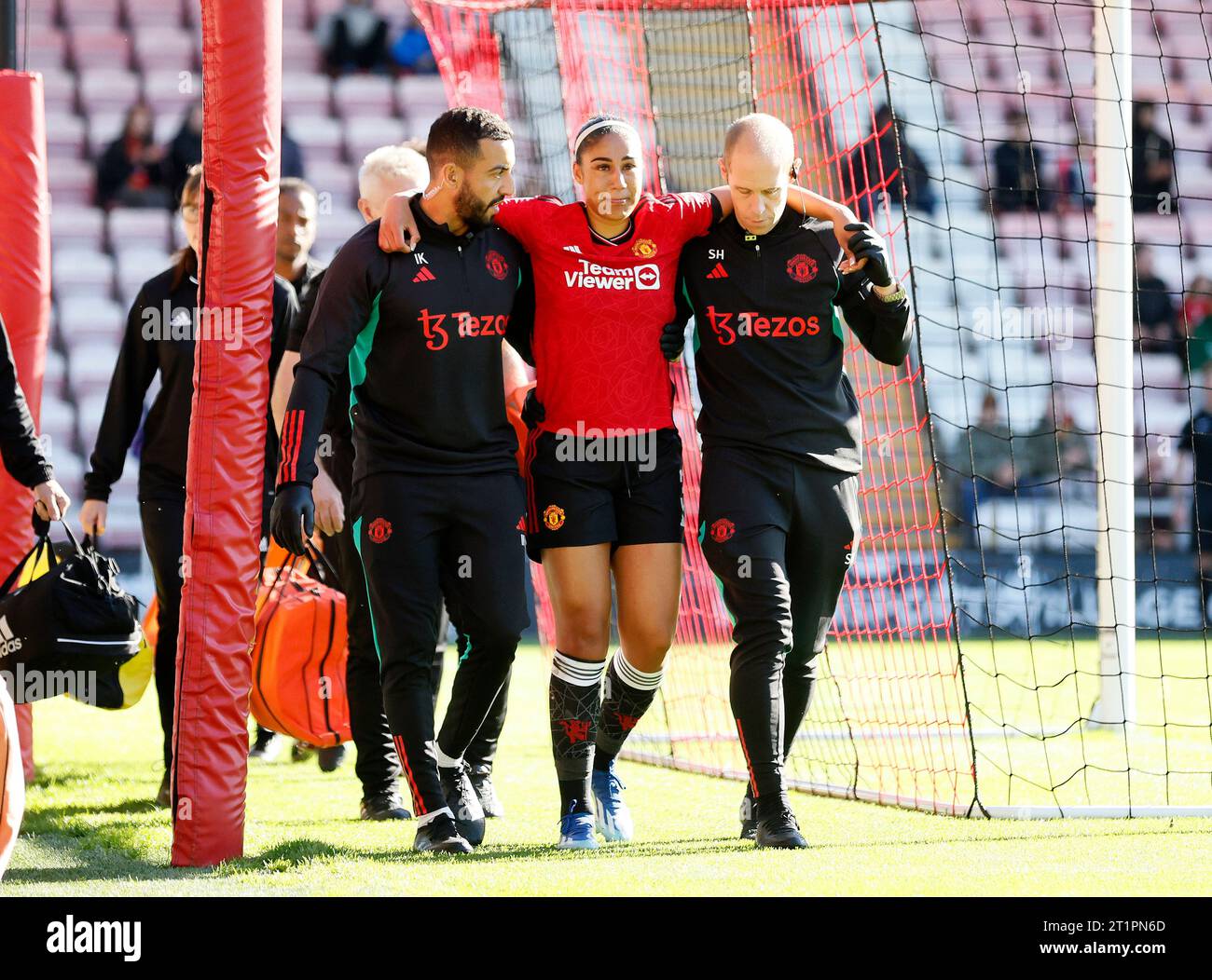 Manchester United's Gabby George leaves the game with an injury during ...