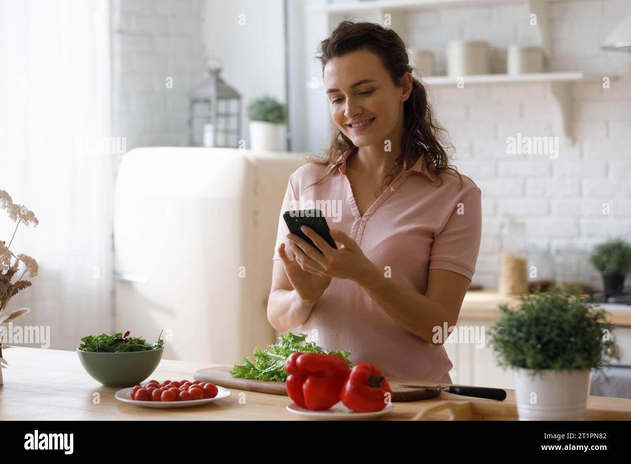 Happy millennial food blogger girl taking picture of fresh vegetables ...