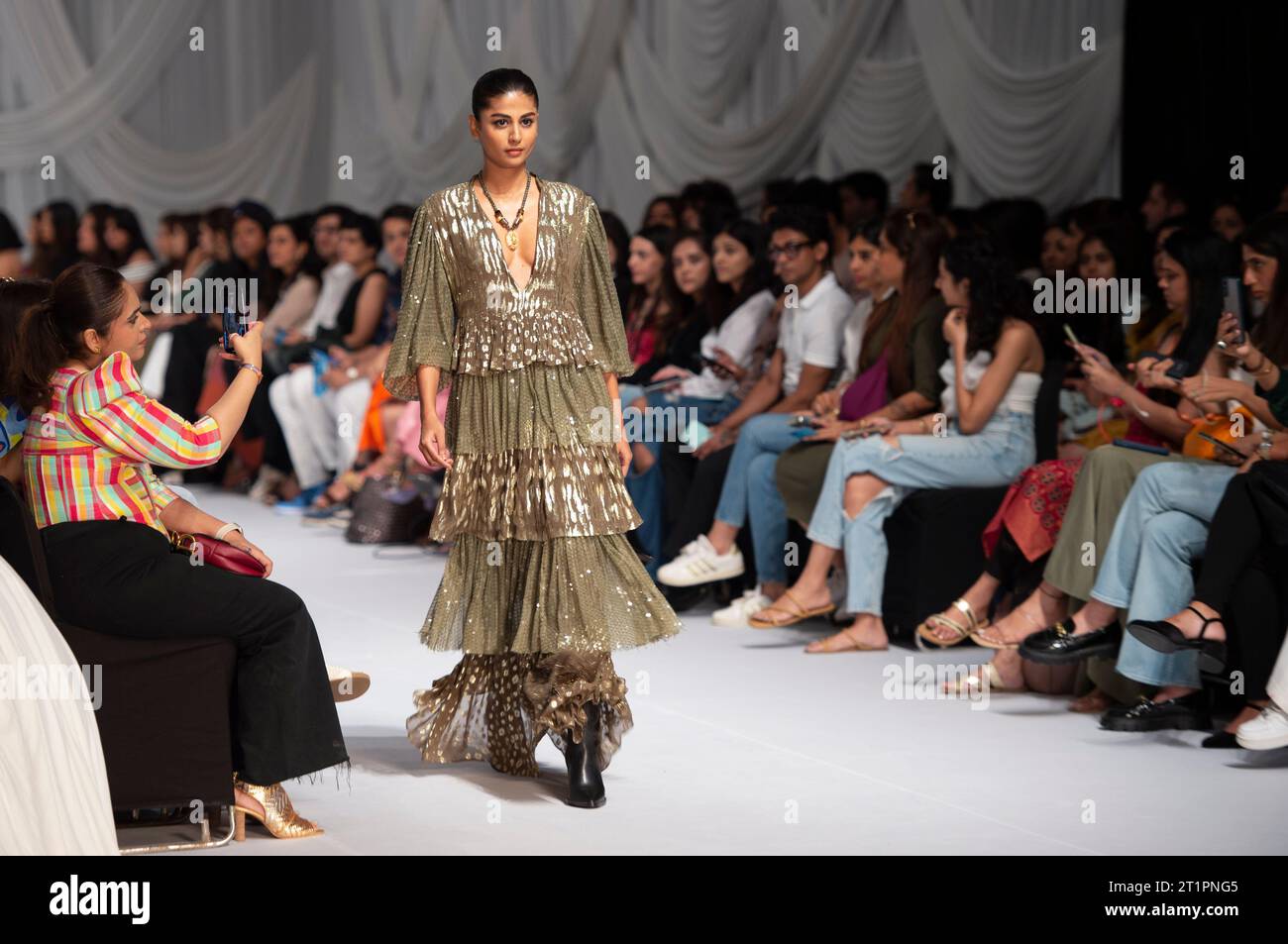 New Delhi, India. 14th Oct, 2023. A model presents a creation by Indian ...