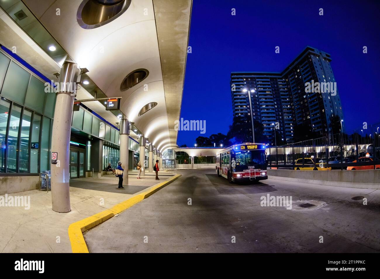 A TTC public bus drives by a platform in the newly renovated Victoria ...