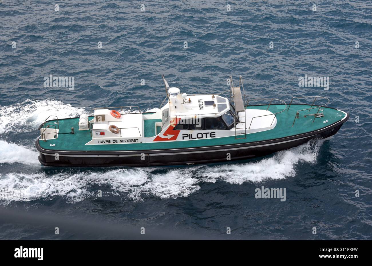 13 July 2023, France, Marseille: A pilot boat sails in the harbor area ...