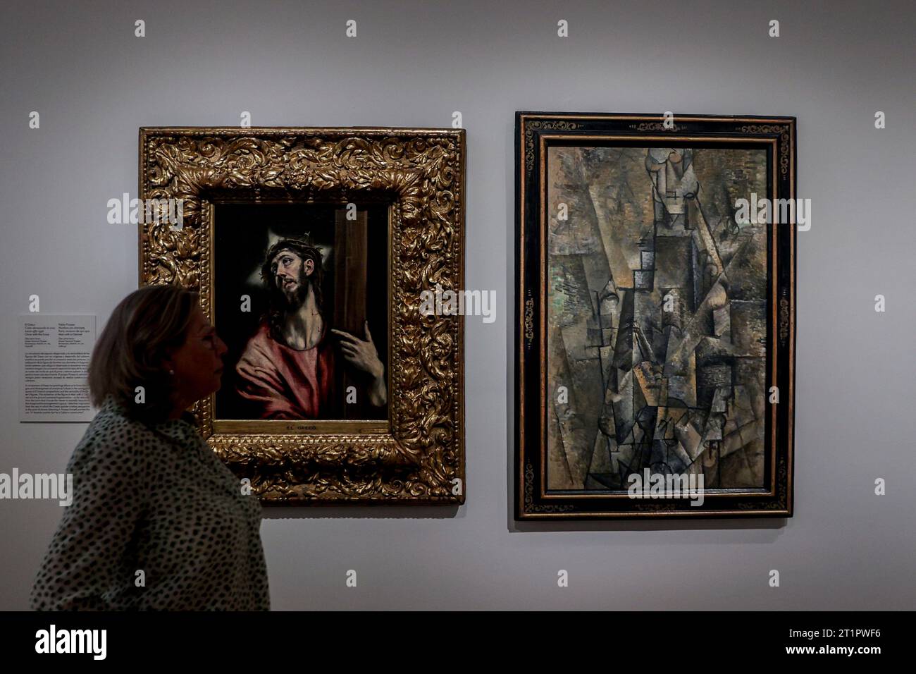 A person observes the works of the exhibition 'Picasso. The Sacred and ...
