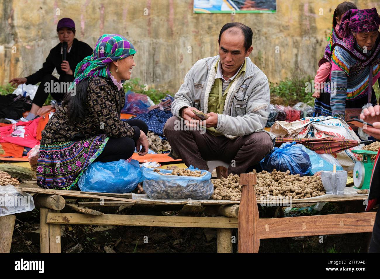 Can Cau Market Scene, Vietnam. Hmong Man Buying Ginger from Vendor. Lao ...