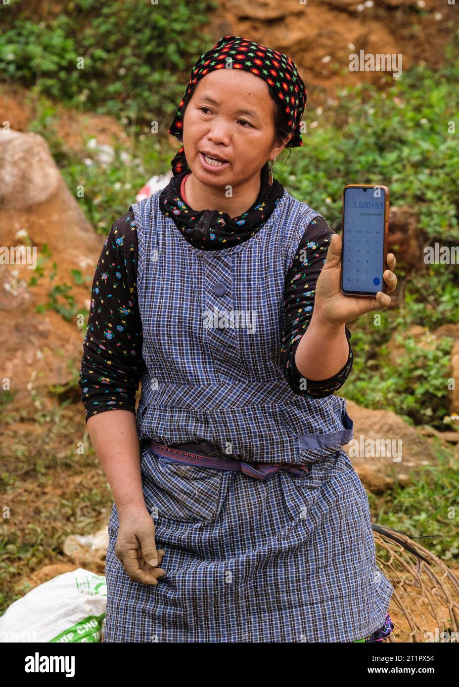 Can Cau Market Scene, Vietnam. Hmong Woman Checking Math Calculation on ...