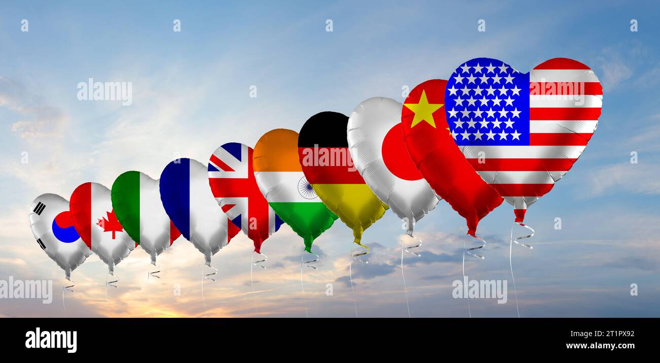 National Flags against blue sky with sun and cloud Stock Photo - Alamy