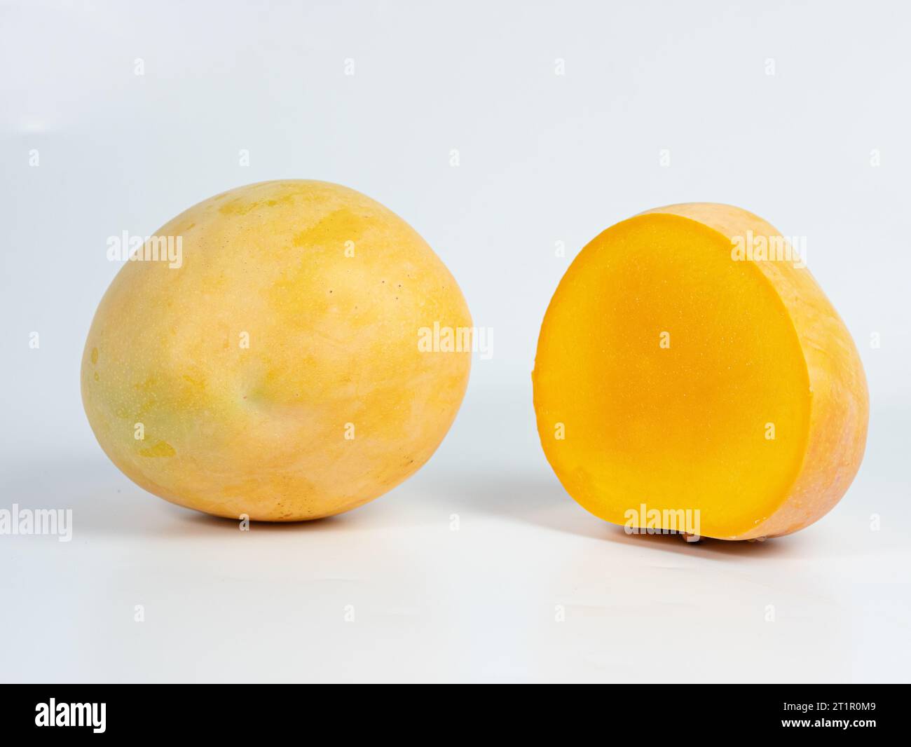 fresh mango fruit isolated on white background Stock Photo - Alamy