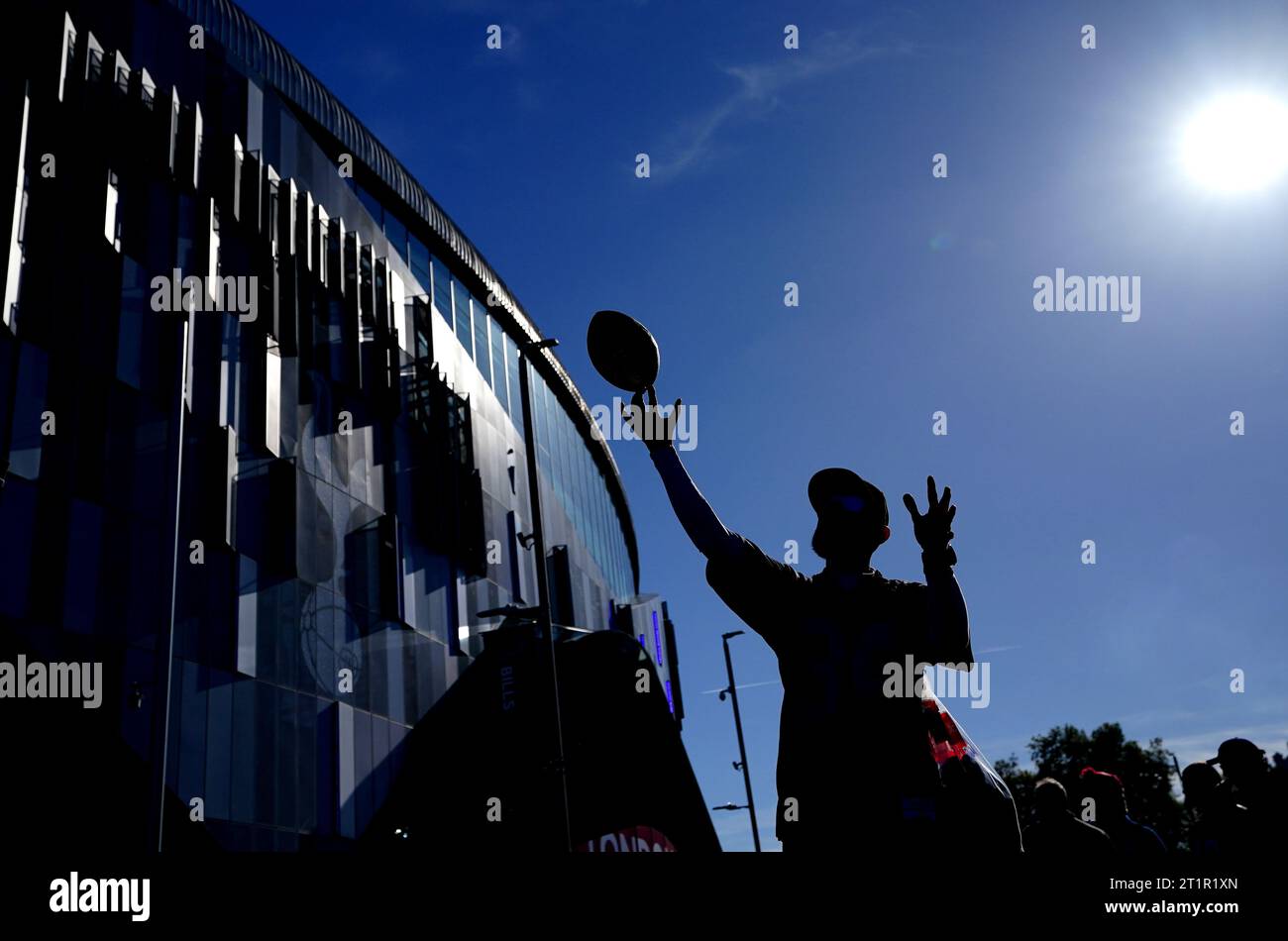 NFL fans throw a football around prior to the NFL international match ...